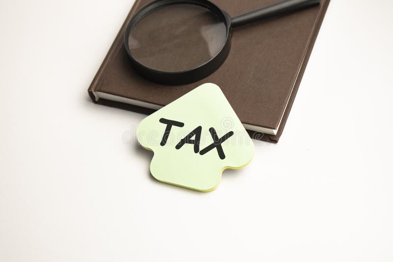 Magnifying Glass with Tax Sign on the Paper Sheet Stock Photo - Image ...