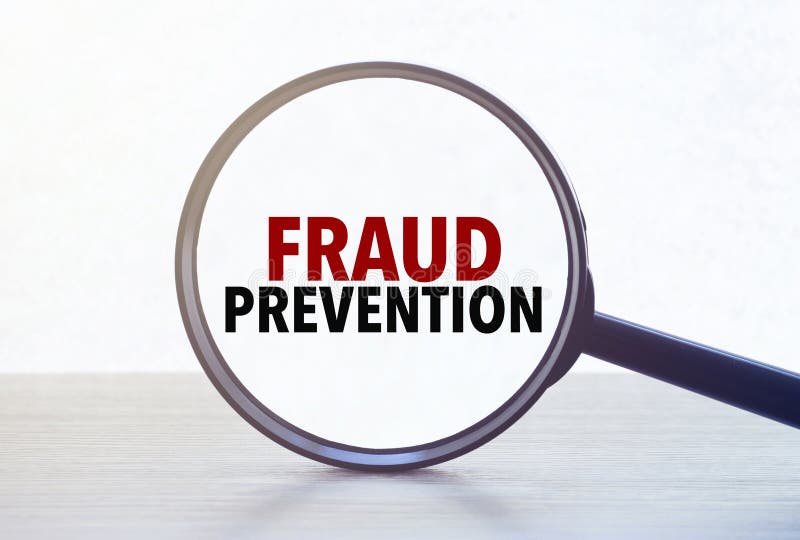 Magnifying Glass with Text Fraud Prevention on Wooden Table Stock Image ...