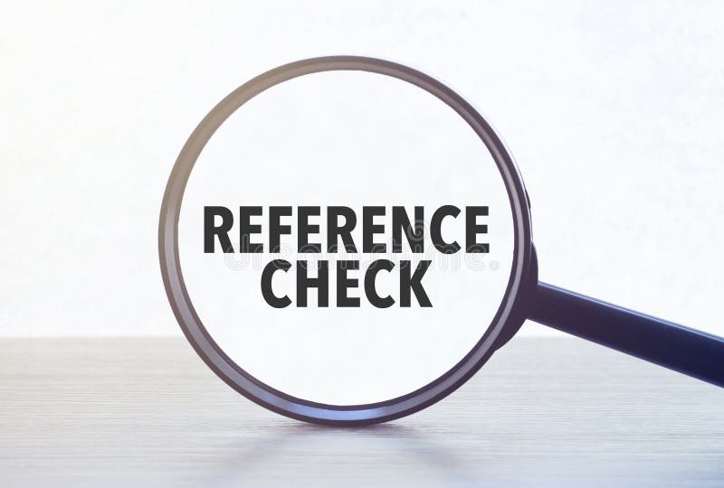 Magnifying Glass with Text REFERENCE CHECKS on Wooden Table Stock Photo ...