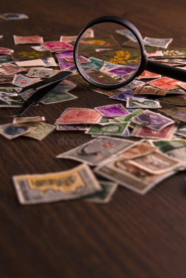 Stamp Collection and Magnifying Glass Editorial Stock Image - Image of ...