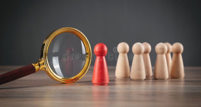 Magnifying Glass and Wooden Human Figures Stock Photo - Image of ...