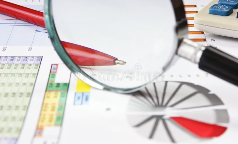 Magnifying Glass and the Working Paper Stock Photo - Image of graphs ...