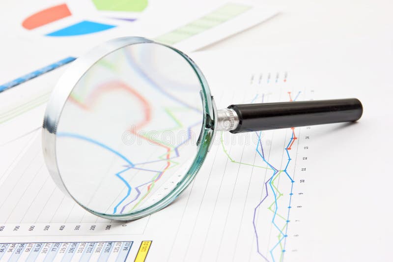 Magnifying Glass and Working Paper Stock Photo - Image of analyzing ...