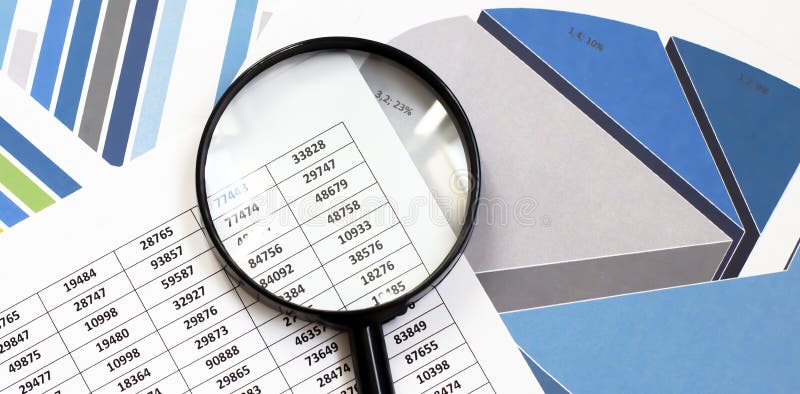 Magnifying Glass and the Working Paper with a Diagram Stock Image ...