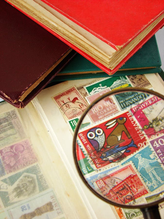 Magnifying Glass and World Postage Stamps Editorial Stock Image - Image ...