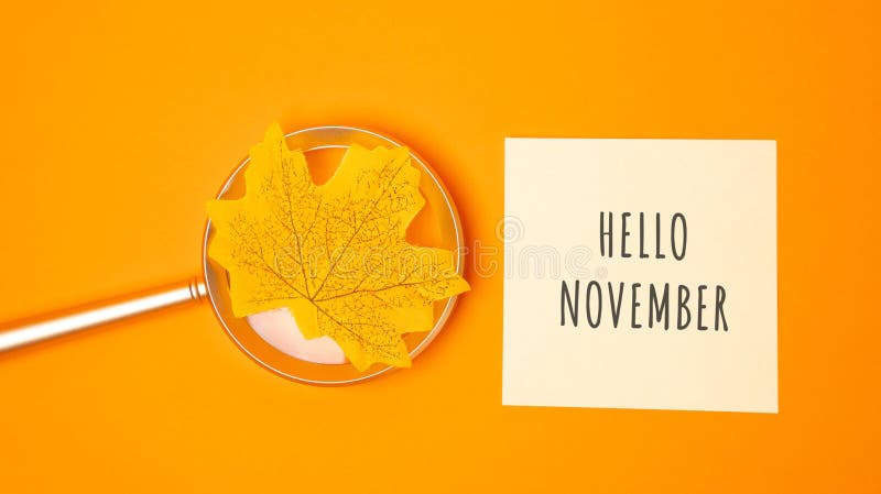 Magnifying Glass with Yellow Leaf and Note with Words Hello November ...