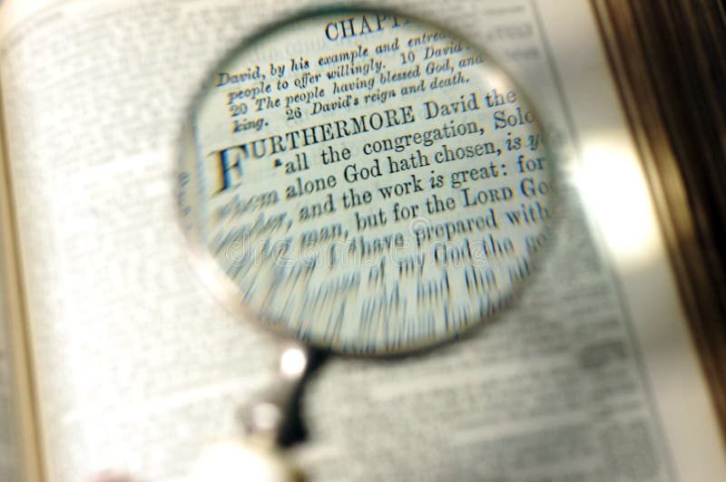 The God Word Comes Bigger Under Magnifier Stock Photo - Image of cross ...