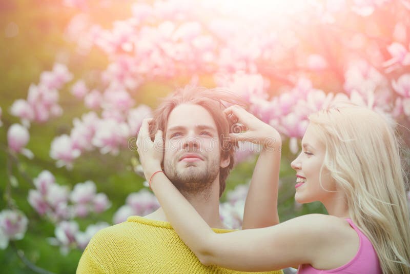 Magnolia, Couple in Love in Spring Flower Blossom Stock Image - Image ...