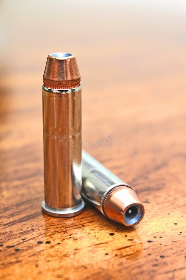 .357 Magnum Caliber Bullets on a Wooden Table Stock Photo - Image of ...