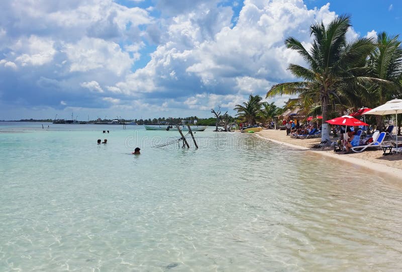 Beach with Boats and Tourist in Mahahual, Mexico Editorial Stock Image ...