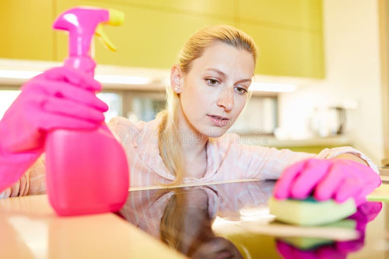 Maid or Cleaning Lady Cleaning the Stove Stock Image - Image of cleaner ...