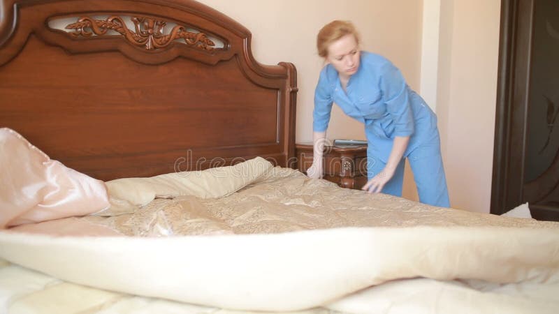 Maid Doing Cleaning in the Bedroom Stock Footage - Video of adult ...