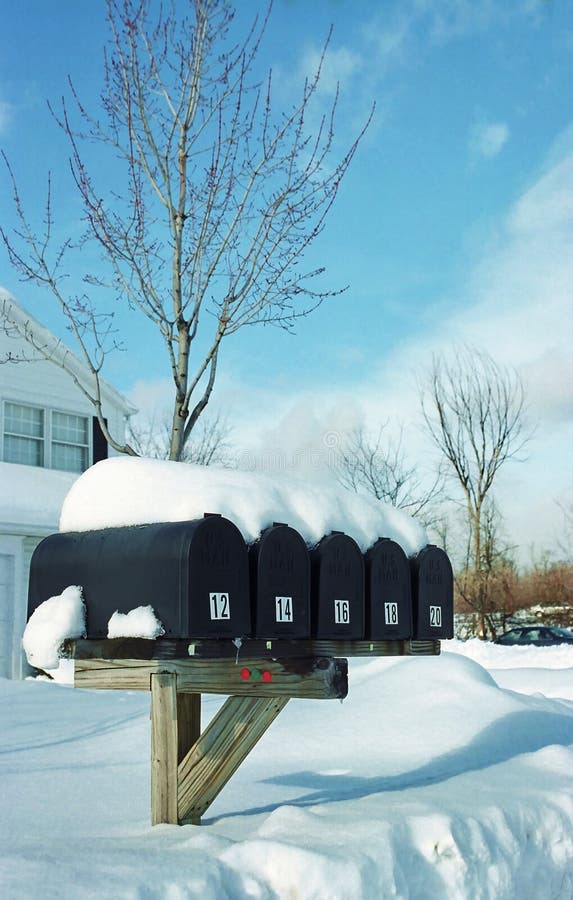 Mail boxes in the snow stock image. Image of card, delivering - 3811785