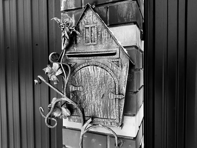Mailbox with forged items stock photo. Image of entrance - 140937842