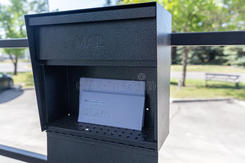 Mailbox with Letters and Packages Delivered by Mail Man Stock Image ...