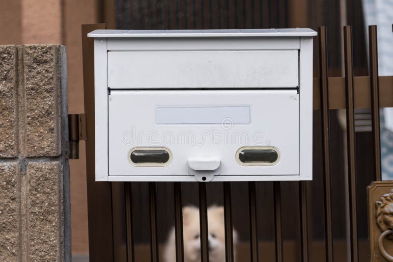 White Mailbox or Post Box at a Gate of a Residential House. Stock Image ...