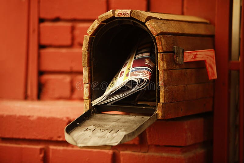 Mailbox and a Red Brick House Stock Image - Image of advertisements ...