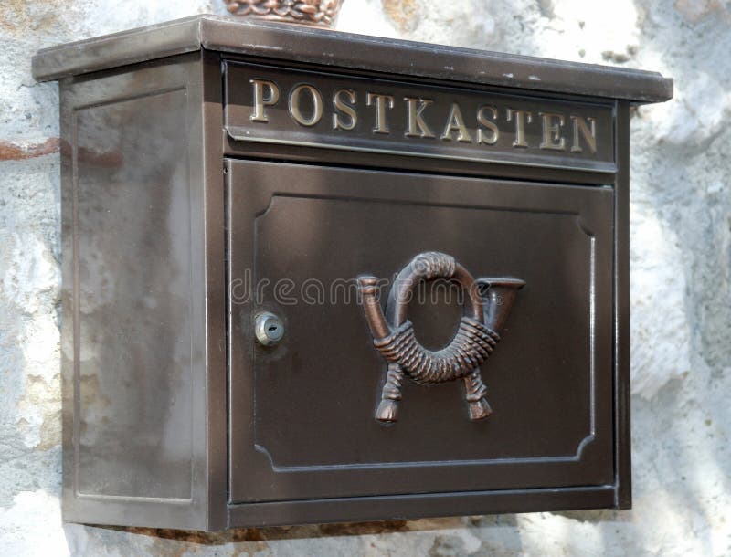 A mailbox on a stone wall stock image. Image of postman - 64839317