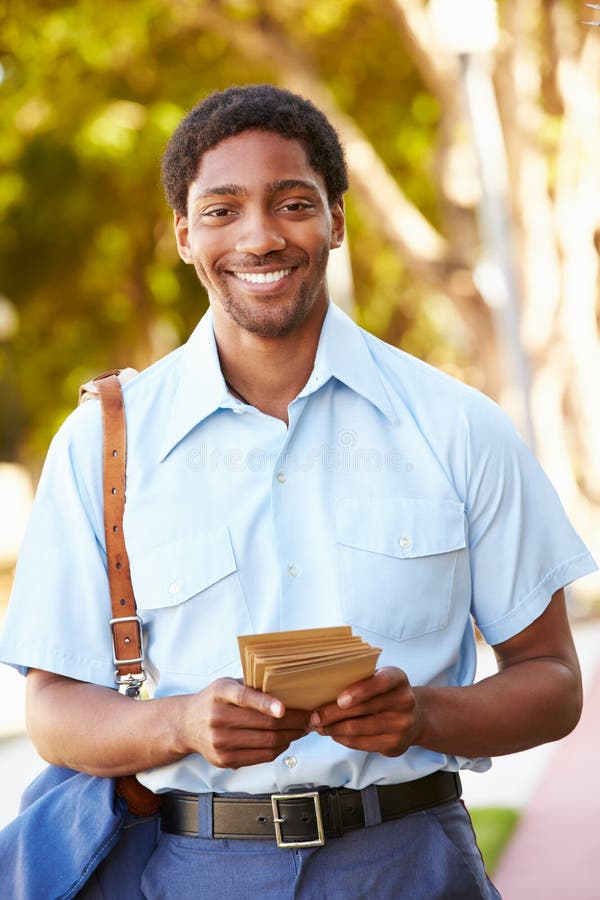 Mailman Walking Along Street Delivering Letters Stock Image - Image of ...