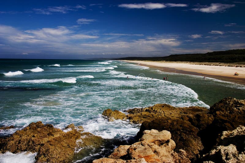 Main Beach stock image. Image of queensland, rocks, hills - 4050107