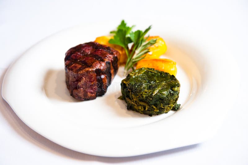Main Course Beef With Spinach White Plate Stock Photo - Image of ...