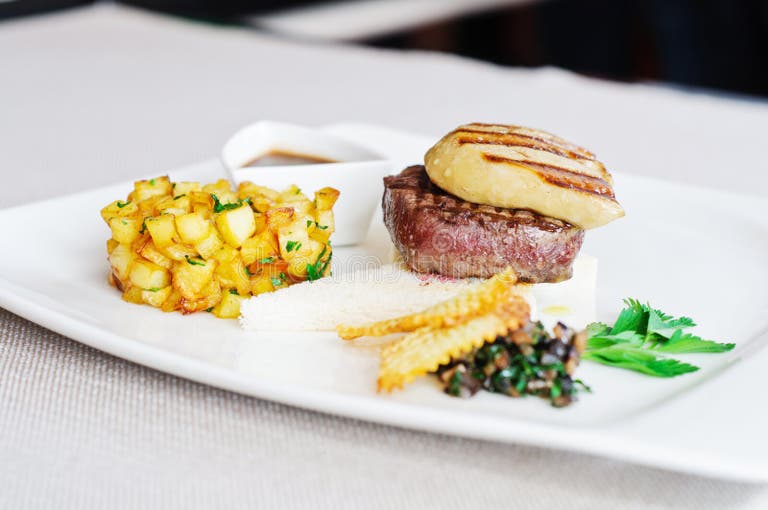 Main Course with Beef Steak and Foie Gras Stock Photo - Image of ...