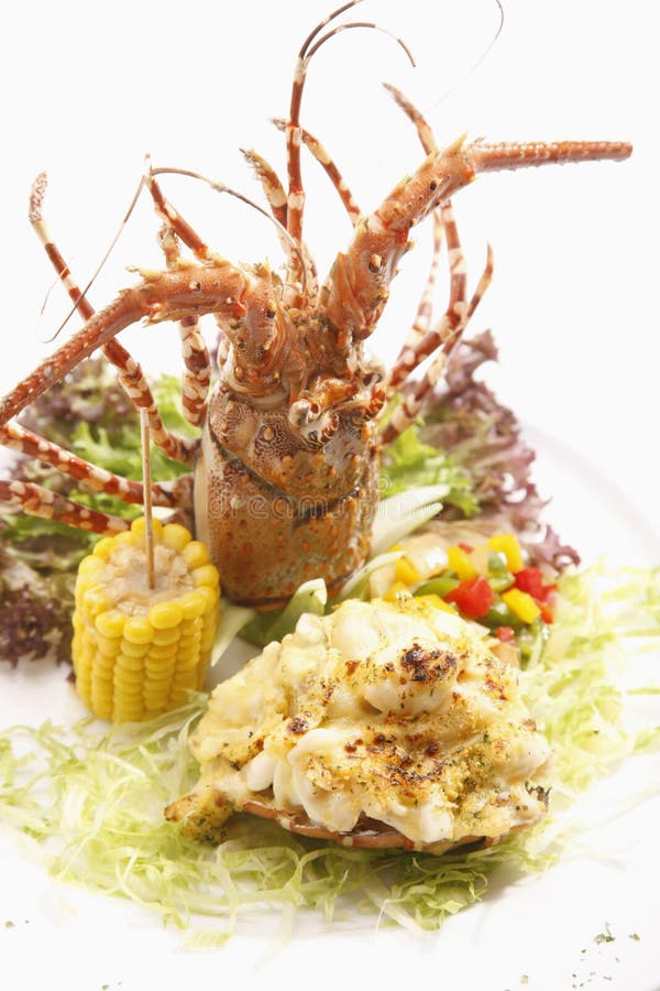 Main Course of Lobster, Corn on Cob and Side Salad. Conceptual Image ...