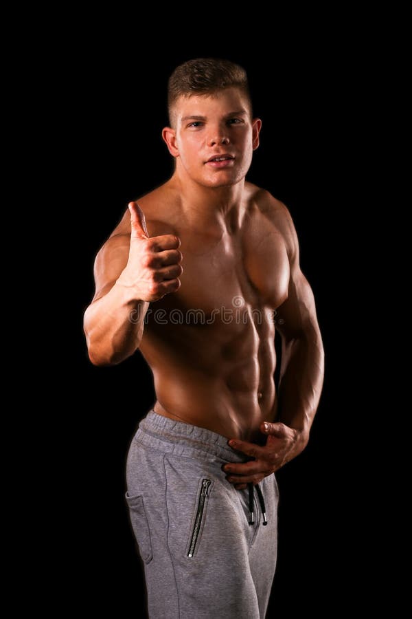 Bodybuilder Dhomme De Muscle Montrant Son Biceps Image Stock Image