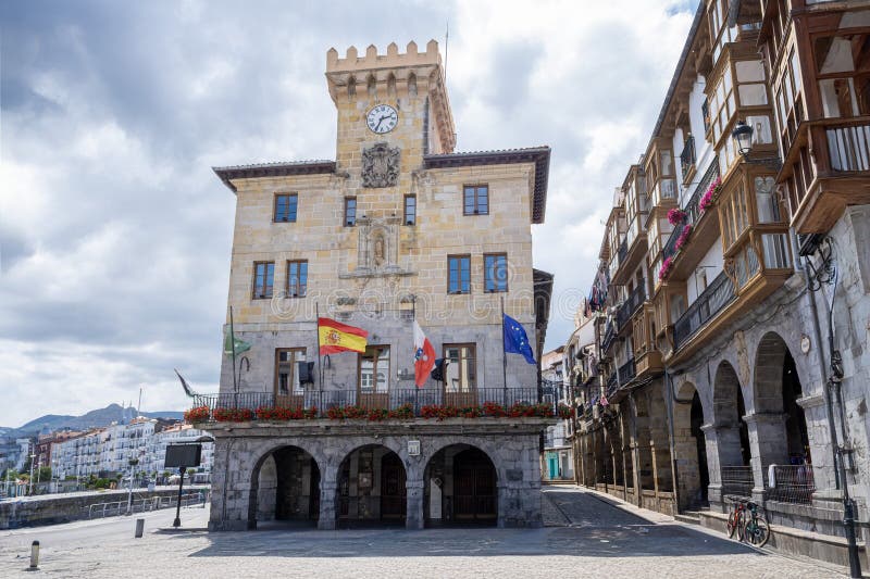 Main Facade of the Town Hall of Castrourdiales, with the Flags Waving ...