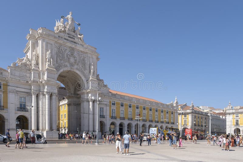 Main Gate of the Lisbon Commerce Square with People Strolling by ...