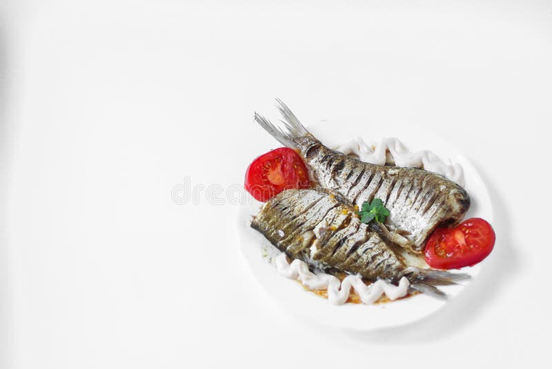 Two Raw Fish on a White Plate Stock Image - Image of garlic, salad ...