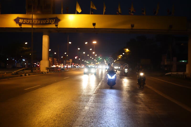 The Main Road at Night, There is a Car Running Back and There is a ...