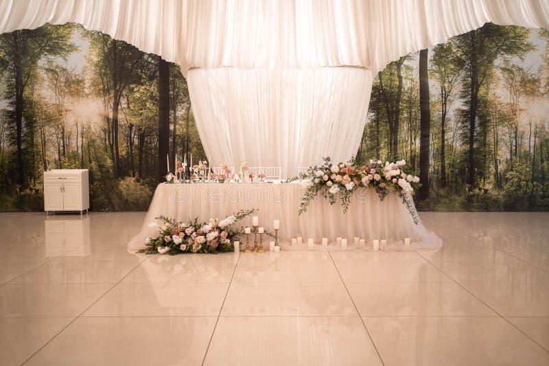 Main Table at a Wedding Reception with Beautiful Flowers and Succuletns ...