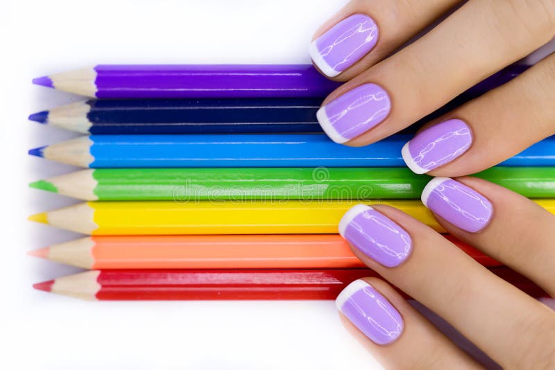 Mains avec des crayons image stock. Image du bleu, clous - 31374987