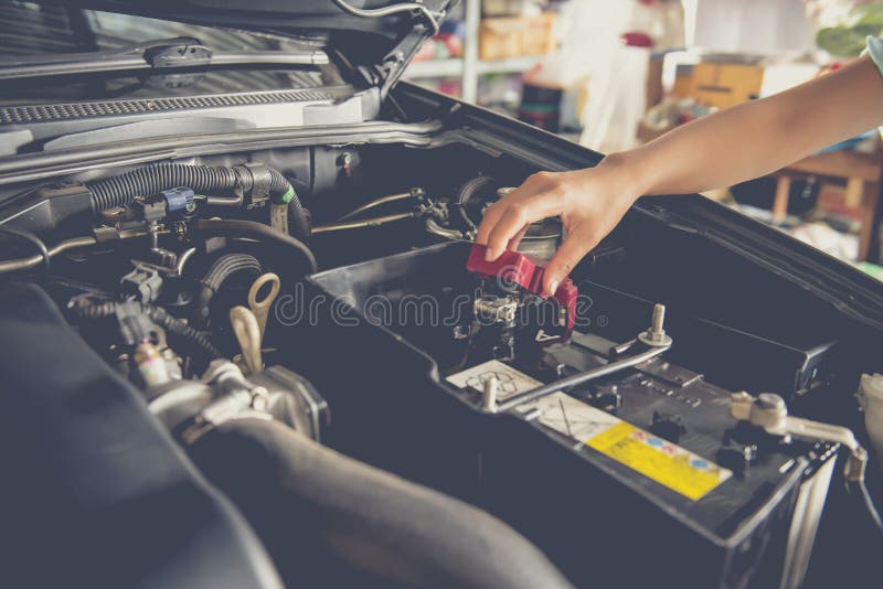 Fitting a Car Battery with Wrench Stock Image - Image of people ...