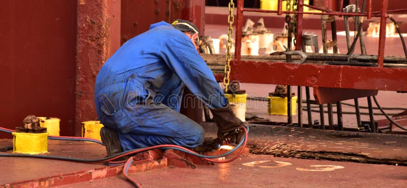 Maintenance on deck editorial stock image. Image of ship - 140758814