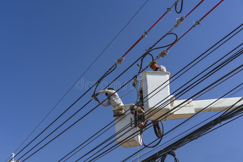 Maintenance of Electricians Work with High Voltage Stock Photo - Image ...