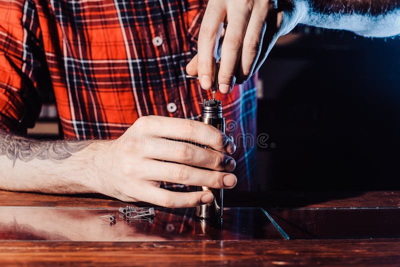 The Process of Servicing the Mechanical Vape Device. Master Replace ...