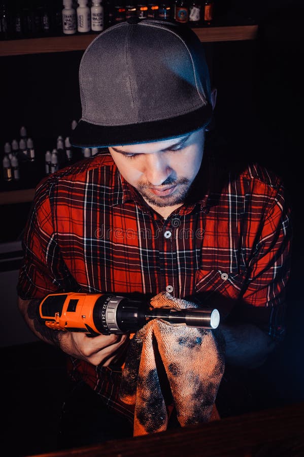 The Process of Servicing the Mechanical Vape Device. Master Replace ...