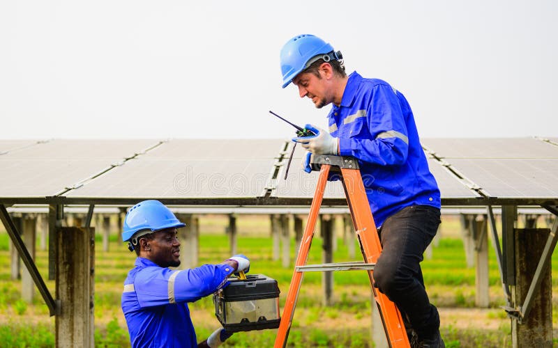 Maintenance Engineer Checking and Installing Solar Panels on Solar Cell ...