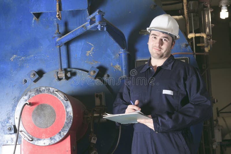 Maintenance Engineer Checking Technical Data of Stock Photo - Image of ...