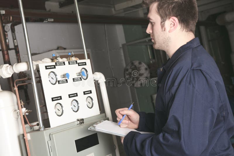 Maintenance Engineer Checking Technical Data of Stock Photo - Image of ...