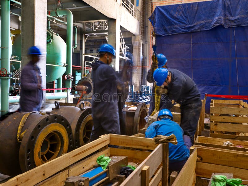 Maintenance Engineer Checking Technical Data of Heating System ...