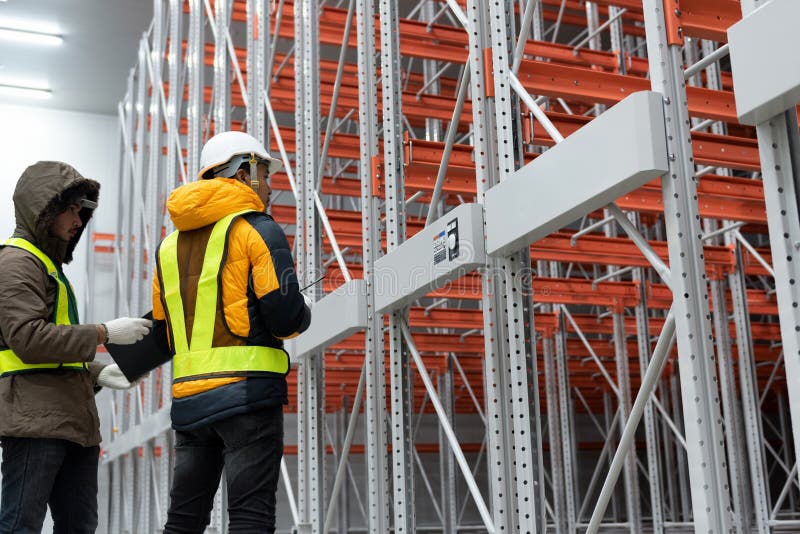 Maintenance Engineering Checking Moving Rack System in Warehouse ...