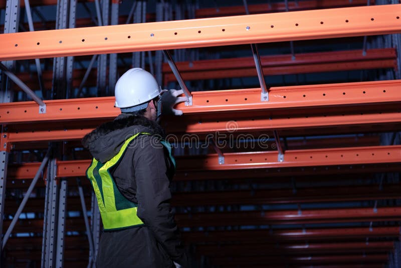Maintenance Engineering Checking Moving Rack System in Warehouse ...