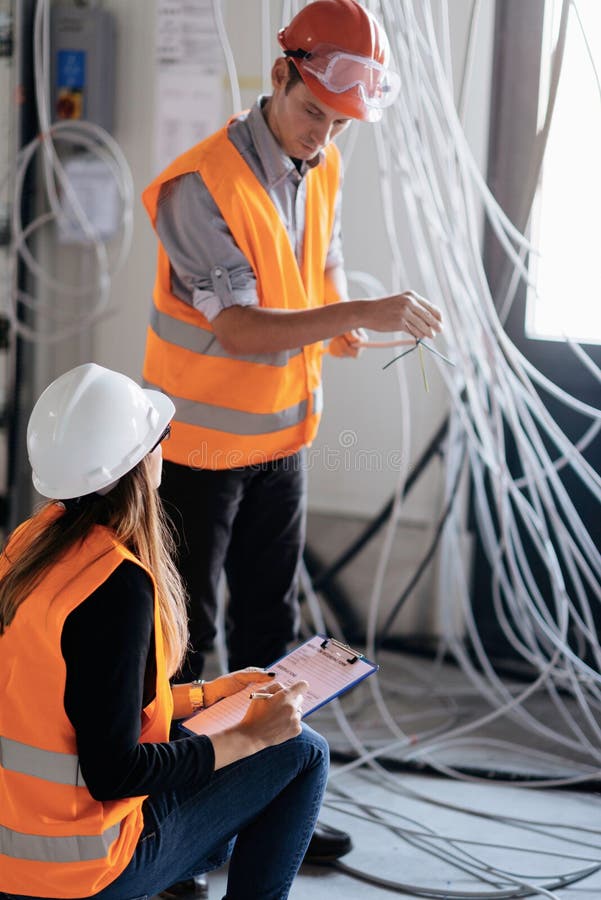 Maintenance Engineers Checking Cables Stock Photo - Image of business ...