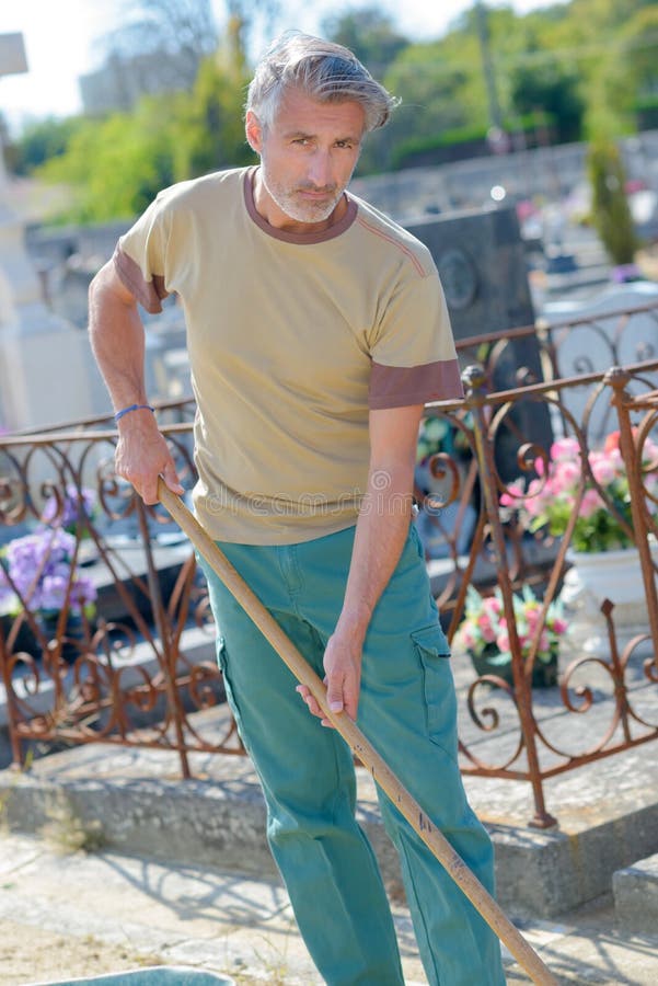 Maintenance Man Working in Cemetery Stock Photo - Image of portrait ...