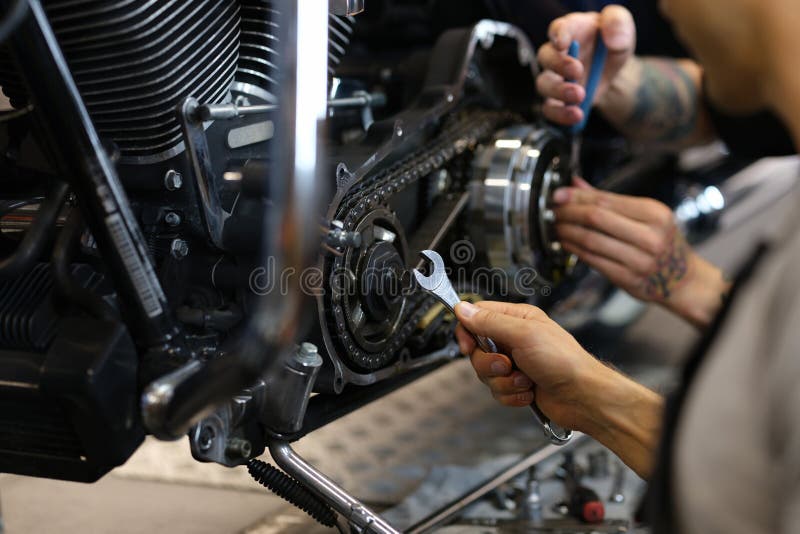 Maintenance of Motorcycle Engine Clutch System by Technicians Stock ...