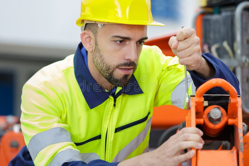 Maintenance Service Engineer Working with Mechanical Machine Stock ...