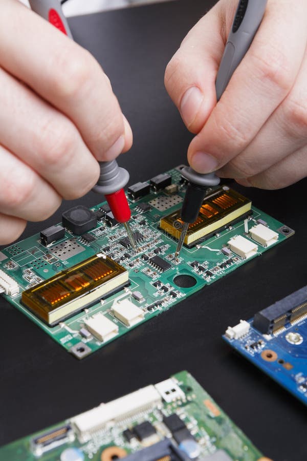 Electronic Circuit Board Inspecting Close Up Stock Image - Image of ...
